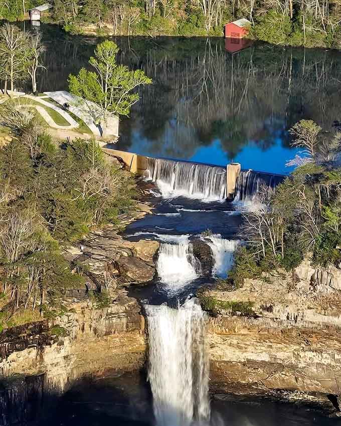 Water cascading over ancient rock formations creates nature's own symphony, no streaming subscription required for this performance.
