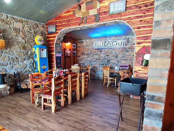 Stone archways and wooden beams create an atmosphere that's equal parts cozy cabin and rustic paradise.