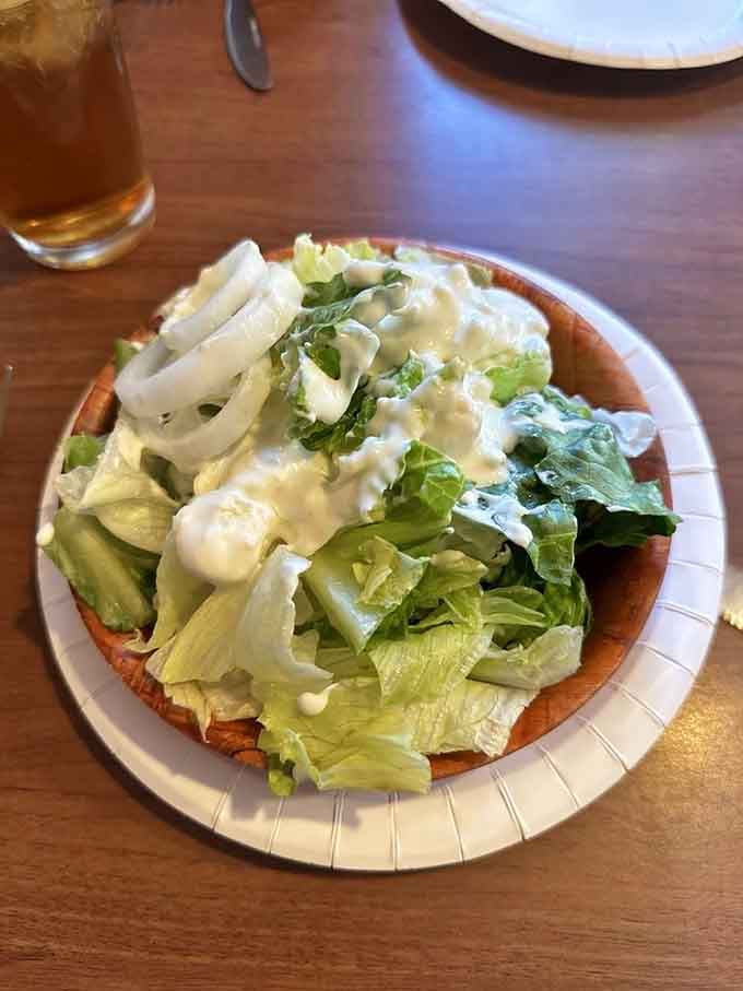 Even the Caesar salad looks fresh and generous, perfect for pretending you're eating healthy tonight.