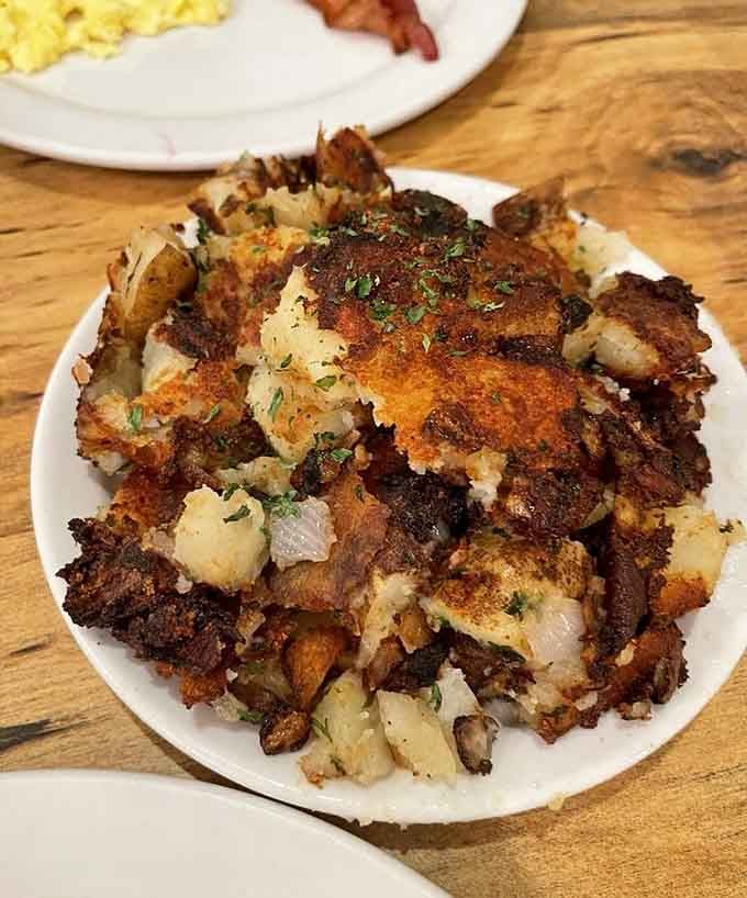 House potatoes so perfectly crispy and golden, they could make a hash brown weep with envy.