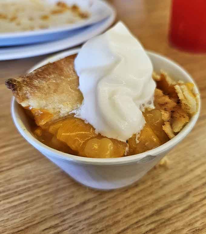 Warm peach cobbler topped with vanilla ice cream is basically summer in a bowl, Arizona style.