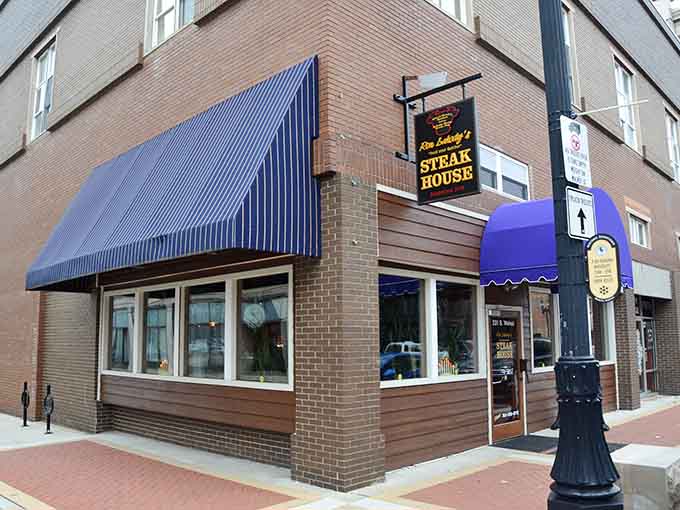 Ron Lahody's steakhouse sits downtown where blue awnings signal serious meat in a no-nonsense setting.