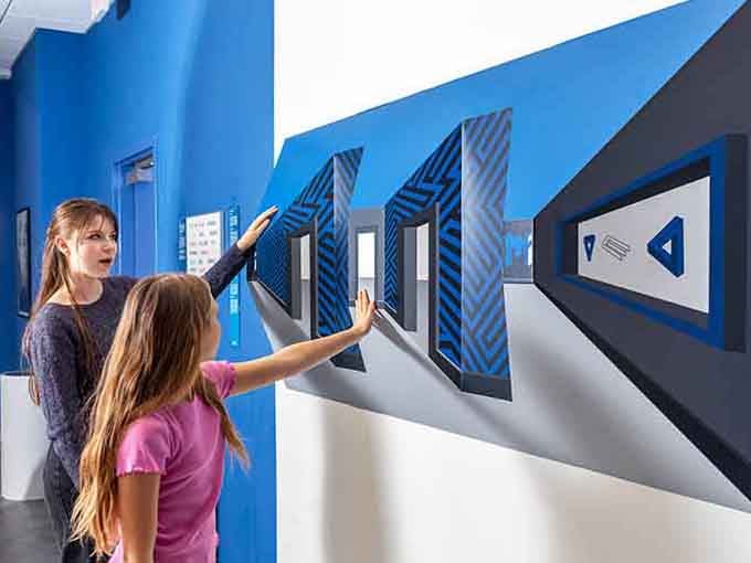 Touch the walls, solve the puzzles, and pretend you're not completely baffled by how any of this works.