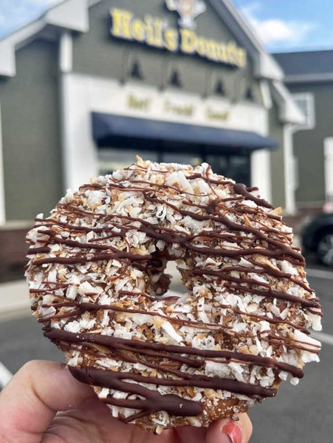 This Samoa-inspired creation is basically Girl Scout cookie season meeting donut perfection, drizzled with chocolate and sprinkled with coconut dreams.