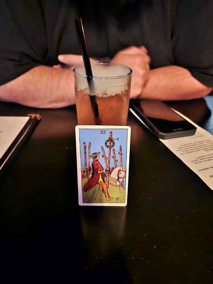 Your cocktail comes with a tarot card reading, mixing mysticism with mixology in unexpected ways.