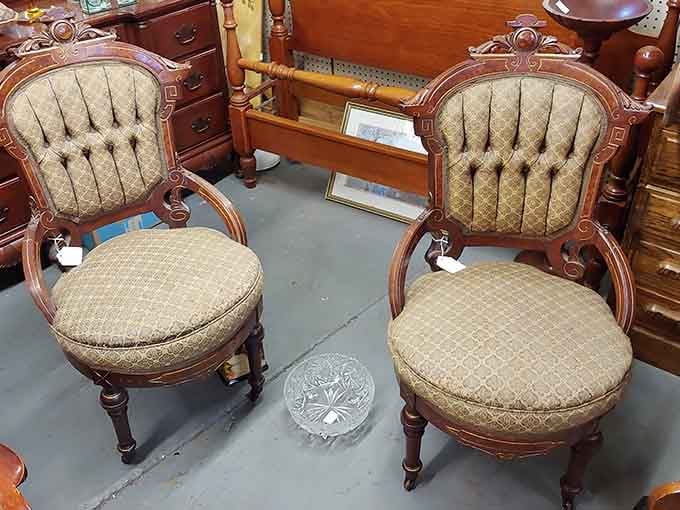 Victorian chairs offering the kind of elegant seating that makes you sit up straighter and feel fancier instantly.