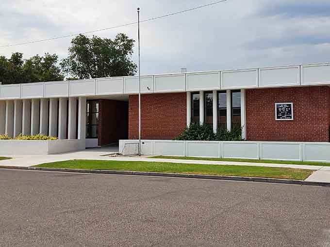 Clean lines and mid-century modern design house knowledge and community programs, proving libraries remain relevant in any era.