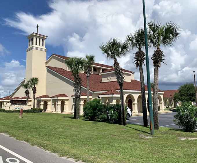 St. Thomas By the Sea's beautiful Spanish-style architecture offers a peaceful place for reflection surrounded by swaying palms.