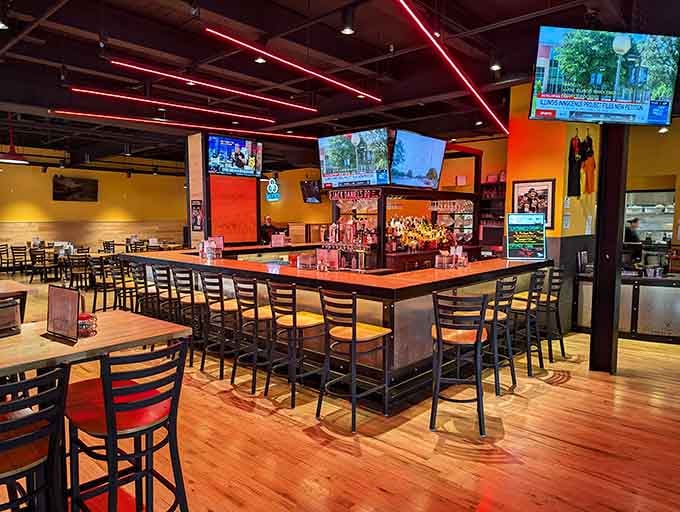 That bar area beckons with craft beers and TVs, the perfect setup for game day pizza consumption.