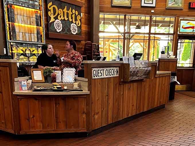 The friendly faces behind the guest check-in, ready to guide you through this wonderfully overwhelming culinary adventure ahead.
