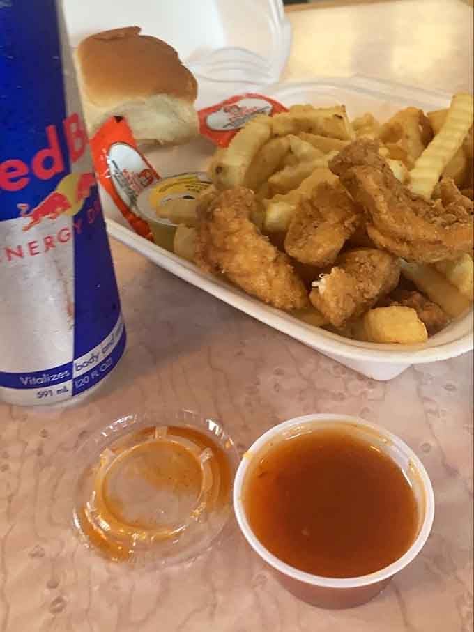 The seafood basket arrives golden and crispy, proving that landlocked doesn't mean you can't do fish right.