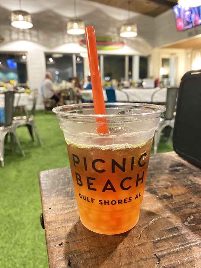 Lychee Boba Tea in a branded cup, because sometimes you need refreshment that's both trendy and delicious.