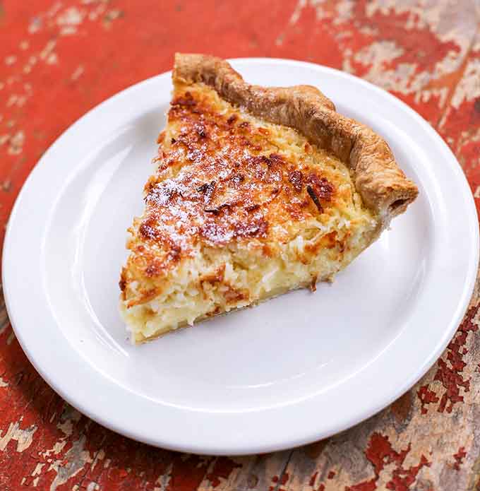 Coconut custard pie in a flaky crust, because every barbecue feast deserves a proper Southern finale.