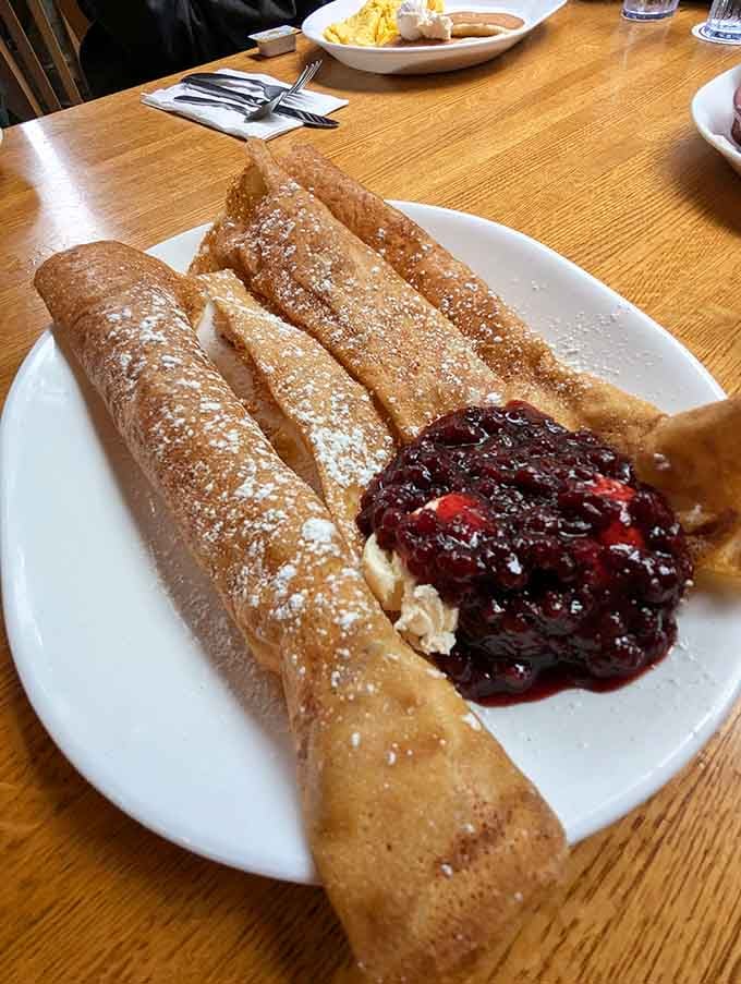 Swedish pancakes rolled with lingonberry compote bring a touch of Scandinavian sophistication to your coastal Oregon breakfast experience.