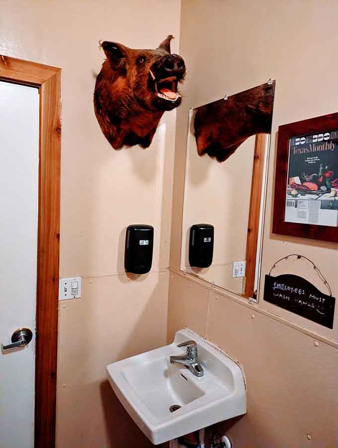 Even the bathroom gets the rustic treatment, because commitment to theme is commitment to theme, folks.