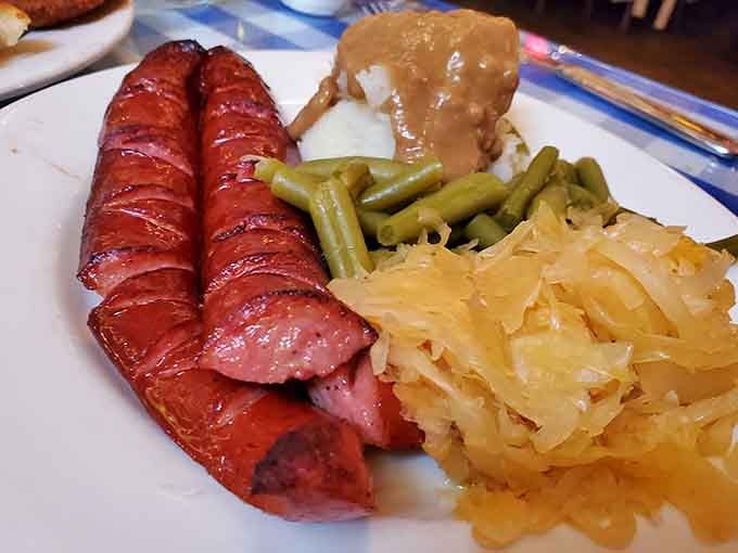 Sliced kielbasa arranged like a meaty accordion, ready to play a symphony on your taste buds.