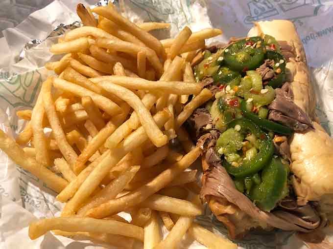 Golden fries accompany your sandwich like the perfect sidekick, crispy and ready to soak up any gravy.