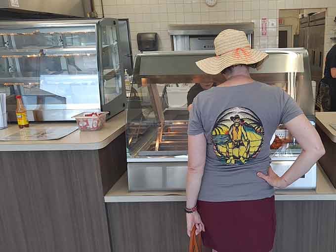 When someone's this focused on their meal, you know the barbecue is doing exactly what it's supposed to do.