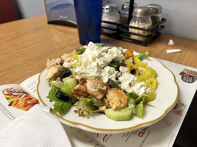 Fresh salad loaded with grilled chicken and feta, for those moments when you pretend to eat healthy before ordering cheesesteak.