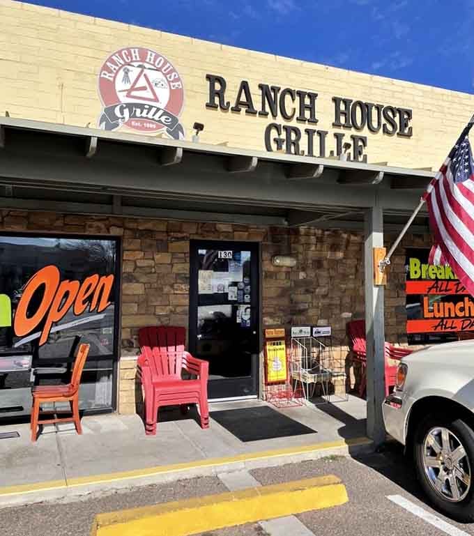 The entrance welcomes you with bright signage and outdoor seating, like your favorite neighbor inviting you over for Sunday dinner.