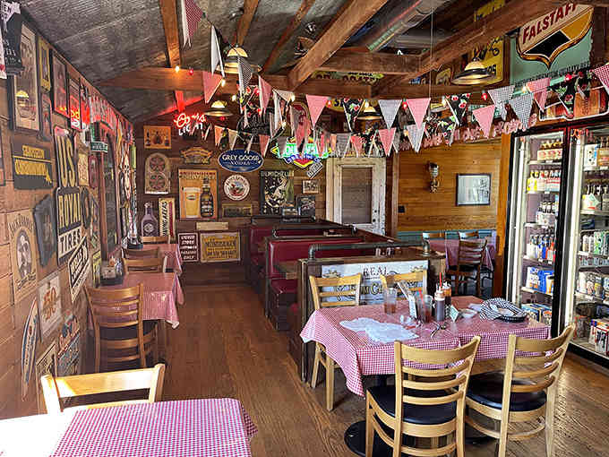 Vintage signs and rustic charm fill every corner, making this feel like your favorite uncle's perfectly decorated man cave.