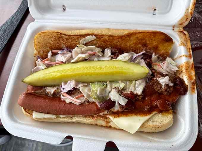 This hot dog with all the fixings and that giant pickle spear is comfort food done the deli way.