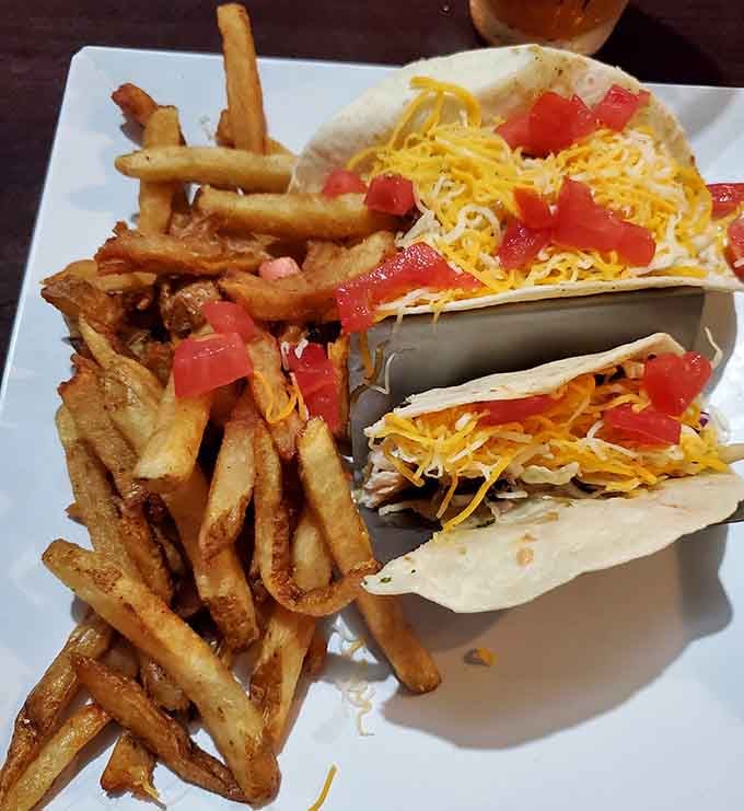 Tacos and crispy fries demonstrate Rick's Reef handles more than just grouper with impressive culinary skill here.