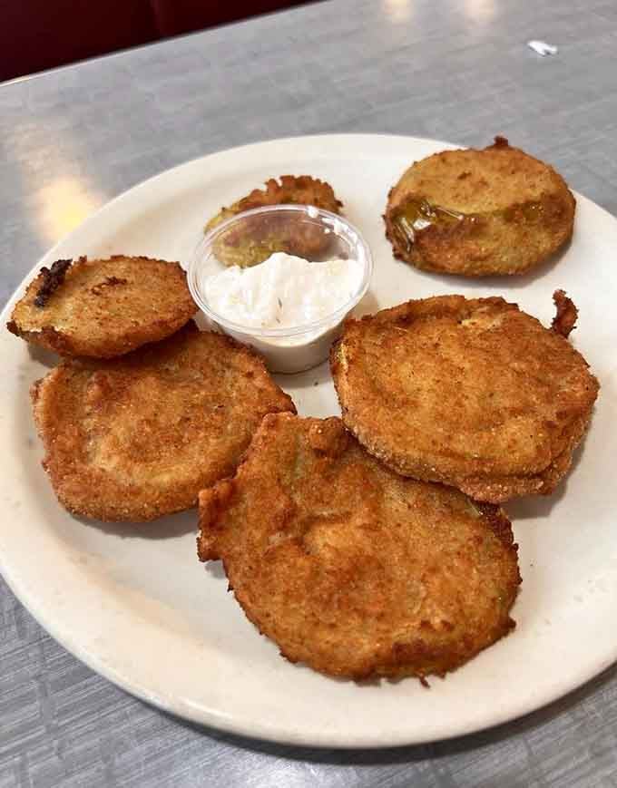 Golden fried green tomatoes arrive crispy and tangy, bringing a touch of Southern hospitality to Pittsburgh's streets.