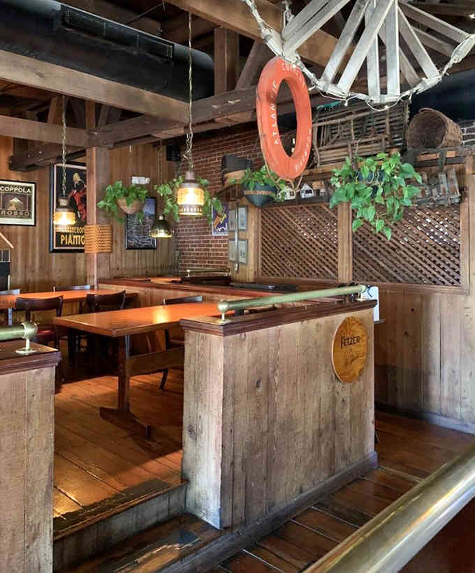 The rustic interior features exposed beams and maritime decor, like eating inside a really nice boat that doesn't move.