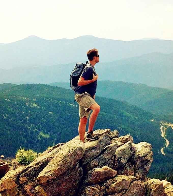 Standing on a rocky outcrop with endless mountain views is the Colorado version of feeling on top of the world.