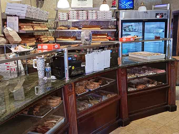 Shelves stocked with fresh bread, rolls, and pastries create a landscape more beautiful than any museum painting ever.