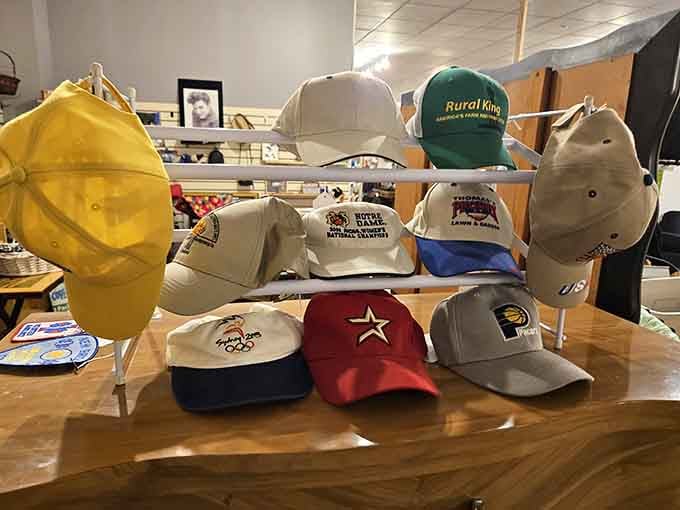 A cap collection representing every team, brand, and questionable fashion choice from decades of American life.