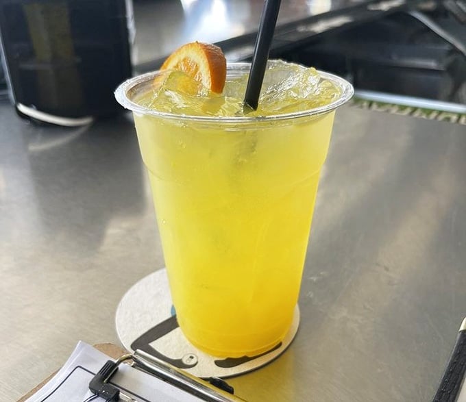 Orange Crush so bright and cheerful, it's basically liquid sunshine with a citrus wedge riding shotgun.