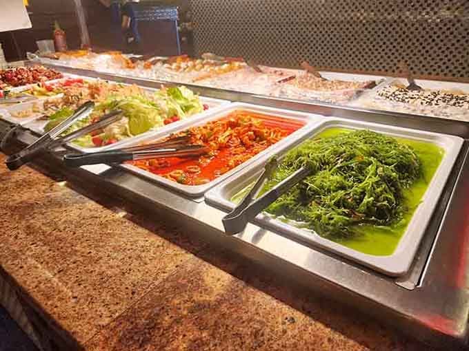 Fresh salads and seaweed provide the healthy options that make you feel slightly better about dessert round two.