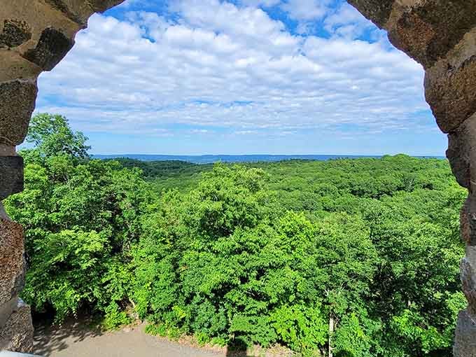 Views through the tower's arches prove Connecticut summers are greener than your neighbor's lawn envy.