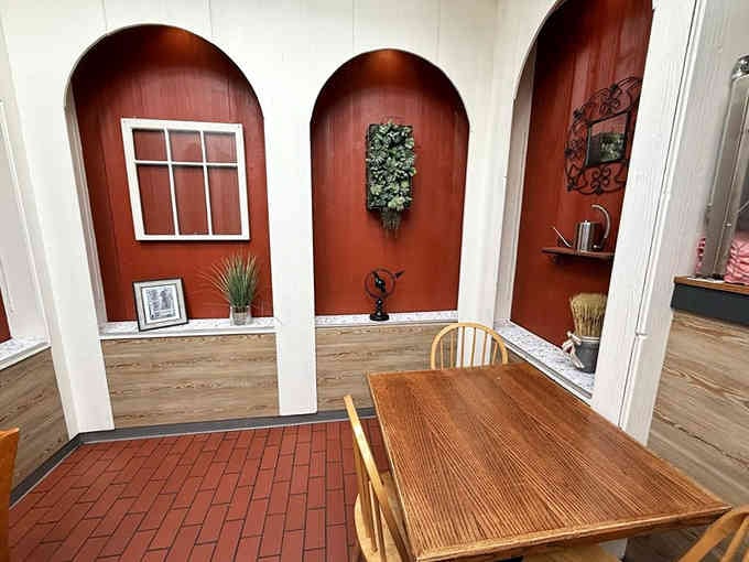Those warm terracotta alcoves create cozy dining nooks that make you want to settle in for hours.