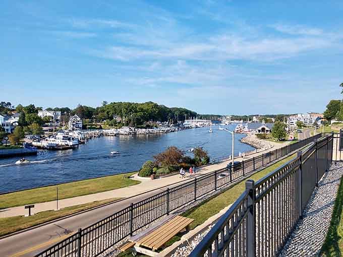 The Black River flowing peacefully toward the lake, flanked by walkways perfect for pretending you exercise regularly on vacation.