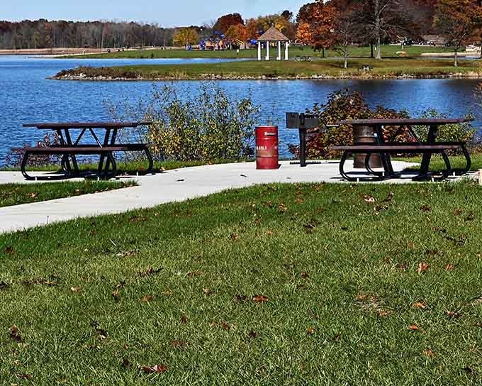 Red and gold trees framing blue water and green grass is Michigan's version of showing off shamelessly.