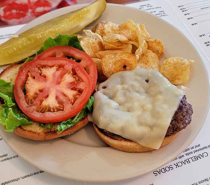 A classic burger with chips proves the Sugar Bowl knows you need substance before the sweet stuff.