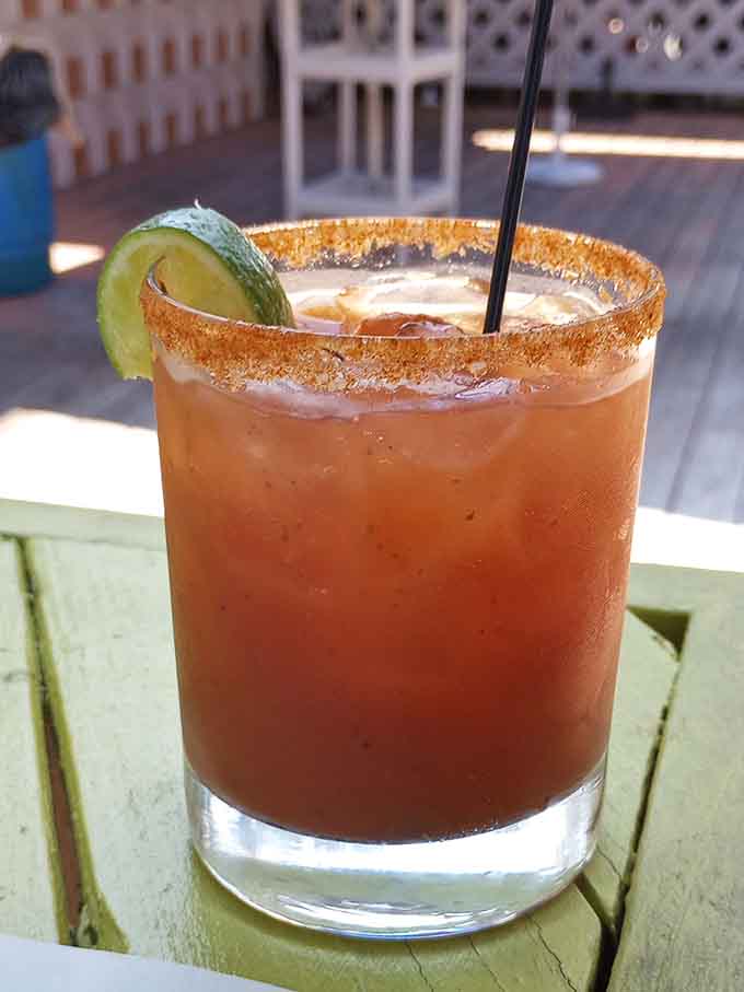 A Bloody Mary with a spiced rim overlooking the marsh is basically liquid vacation in a glass with garnish.