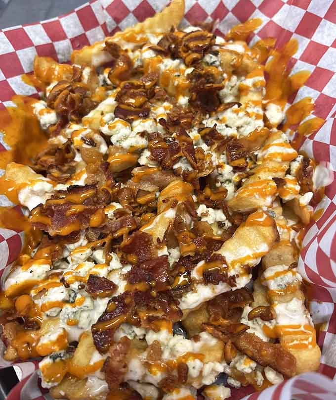 Fun Fries loaded with bacon, cheese, and caramelized onions create a flavor explosion worth every single calorie.