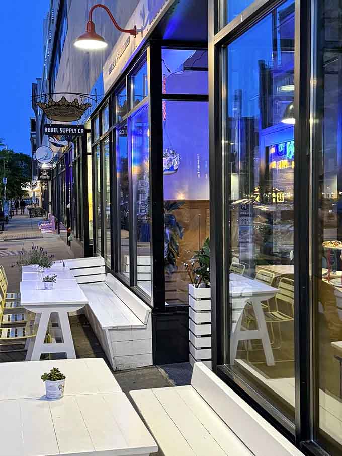 Those white outdoor tables practically beg you to linger over dinner while watching Asbury Park's evening energy unfold around you.
