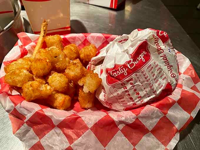 Tater tots served with what appears to be a side of pure nostalgia and childhood cafeteria memories, upgraded significantly.