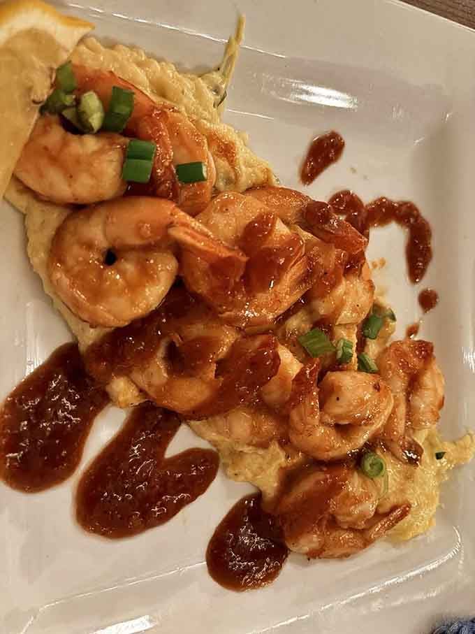 Shrimp and grits with a sauce so good you'll want to lick the plate when nobody's looking.