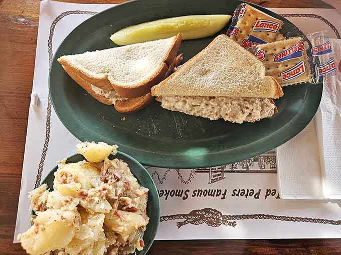 Smoked fish spread sandwich with German potato salad delivers comfort food without apology or pretension.