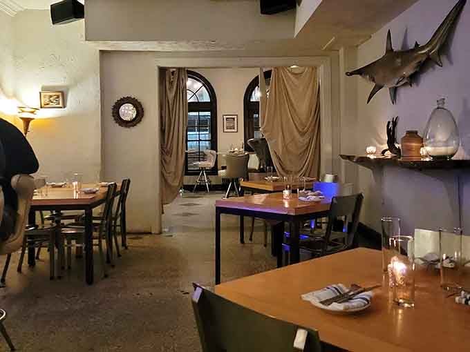 Another angle reveals the spacious dining room with a giant clamshell booth that's basically begging for your next celebration.