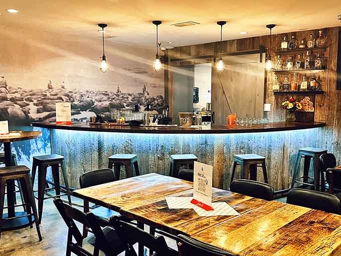 The bar area gleams with promise, offering the perfect spot to wait for your table or just hang out.