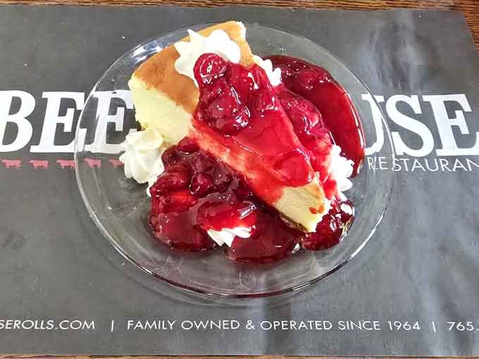 Cheesecake topped with cherry compote and whipped cream is how you end a meal feeling like you've truly lived.