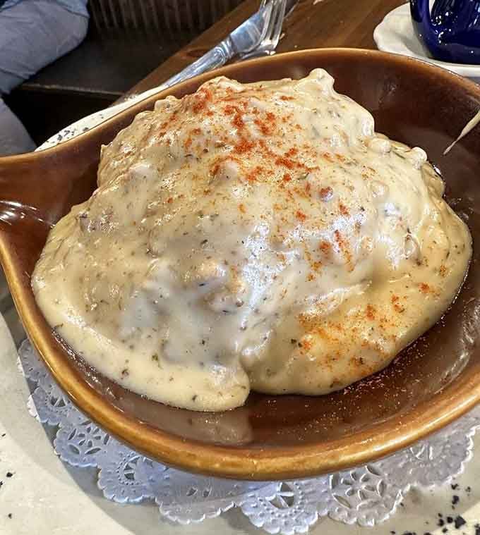 Biscuits and gravy that look like a fluffy cloud decided to become your breakfast companion today.