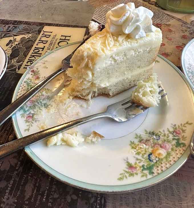 Towering coconut cake that looks like it walked straight out of a Southern grandmother's most treasured recipe box.